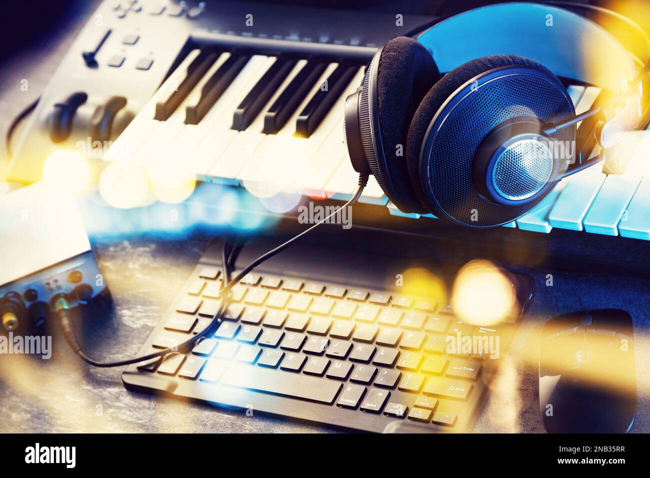 Keyboard Or Synthesizer With Headphones And Sound Card Computer