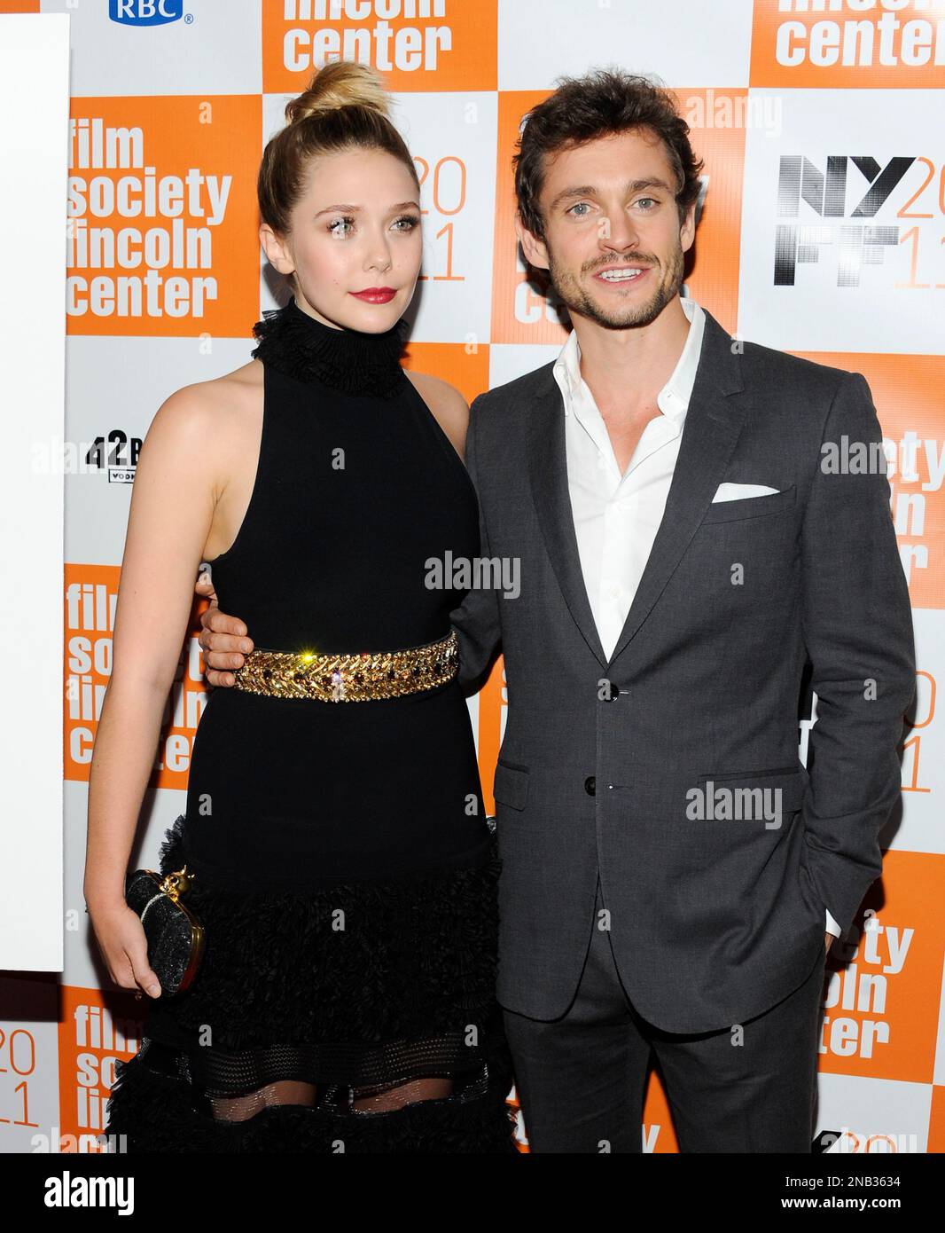Actors Elizabeth Olsen and Hugh Dancy attend a screening of "Martha ...