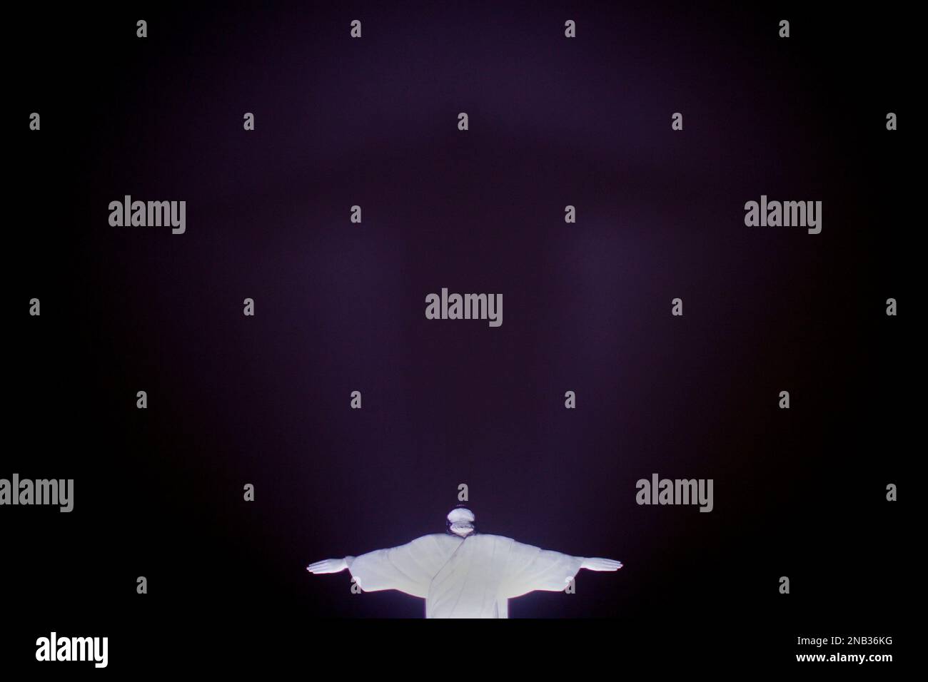 The shadow of the Christ the Redeemer statue casts on a cloud in Rio de ...