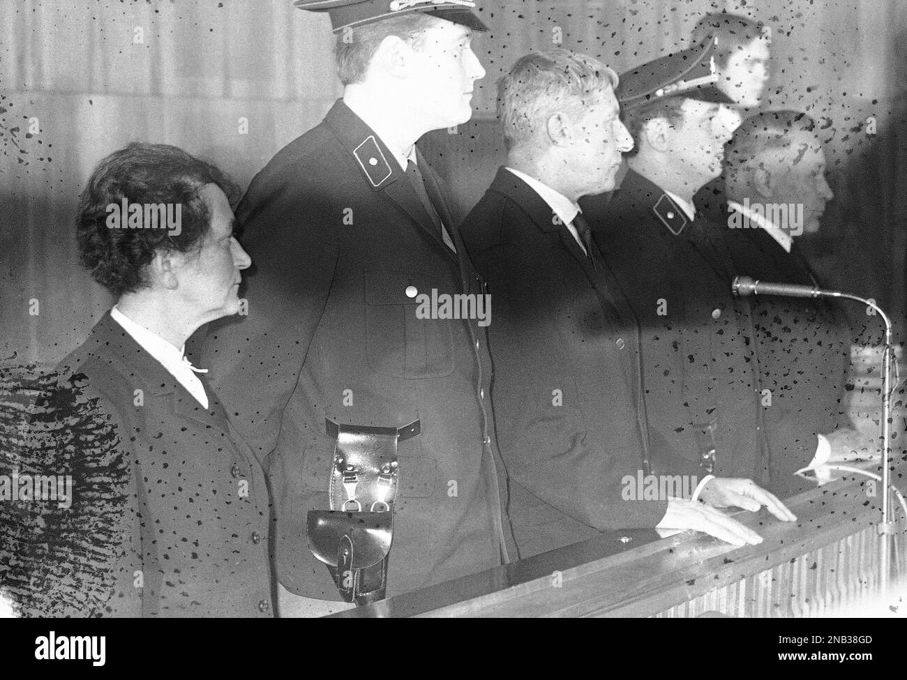 Three former SS members are in a Munich court on Feb. 24, 1967, as the ...