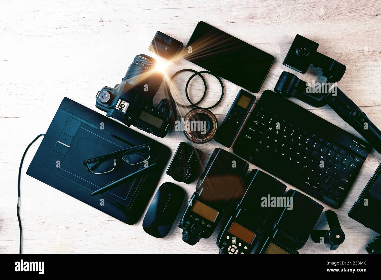 Digital photo workstation over white background.Top view of digital ...