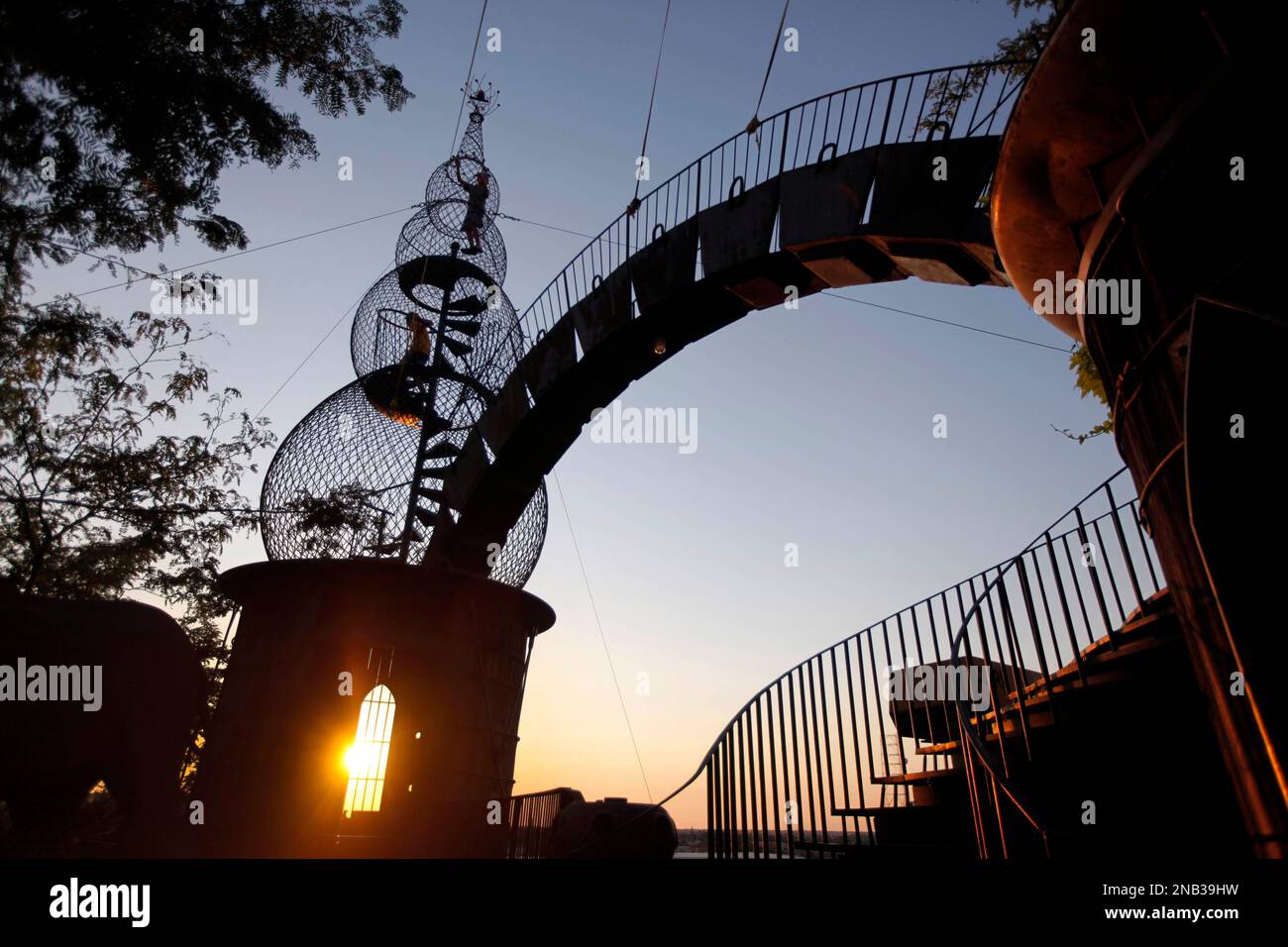In this Friday, Aug. 19, 2011 photo, children climb to the top of a ...
