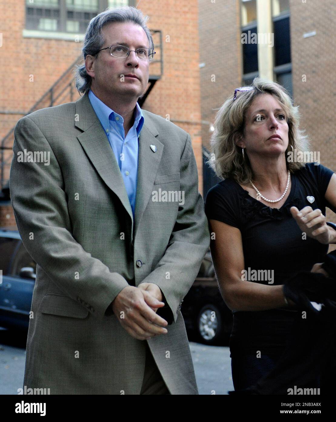 Dr. William Petit Jr., left, and his sister Johanna Chapman arrive at ...