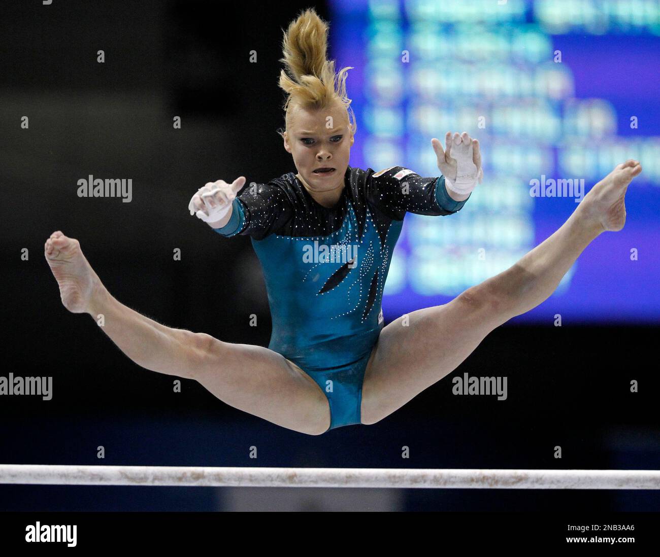 Russias Tatiana Nabieva Performs On The Uneven Bars During The Womens