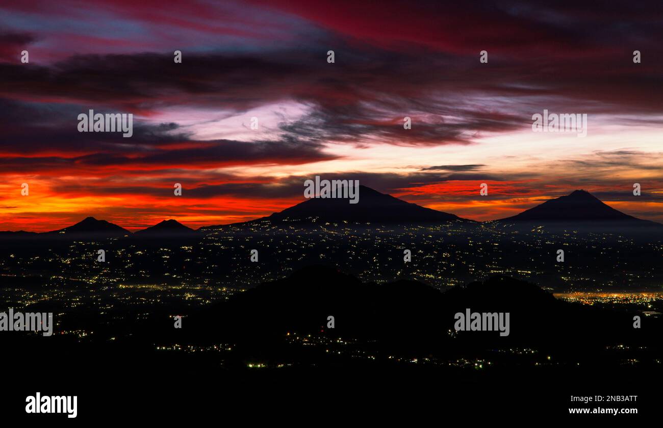 Beautiful colorful epic reddish orange sunrise sky with mountain range ...