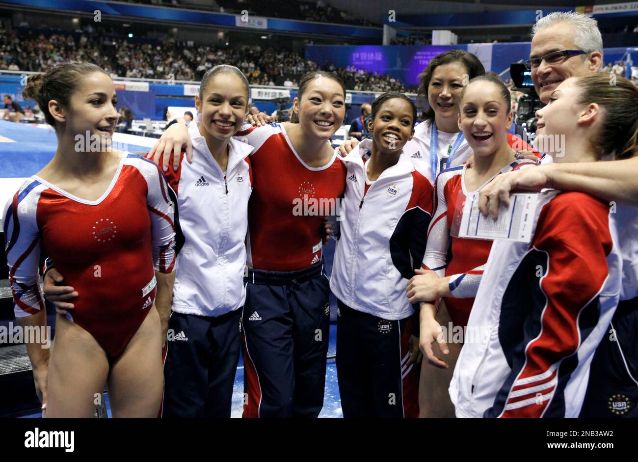USA's gymnasts celebrate after winning the women's team final at the ...