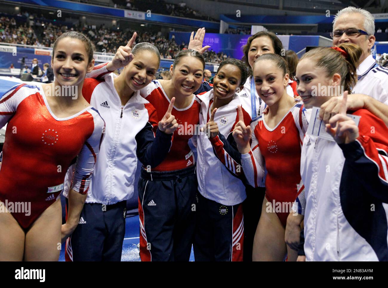 USA's gymnasts celebrate after winning the women's team final at the ...