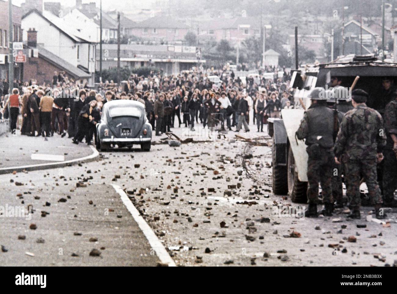 A confrontation between Catholic youths and British troops in a rubble ...