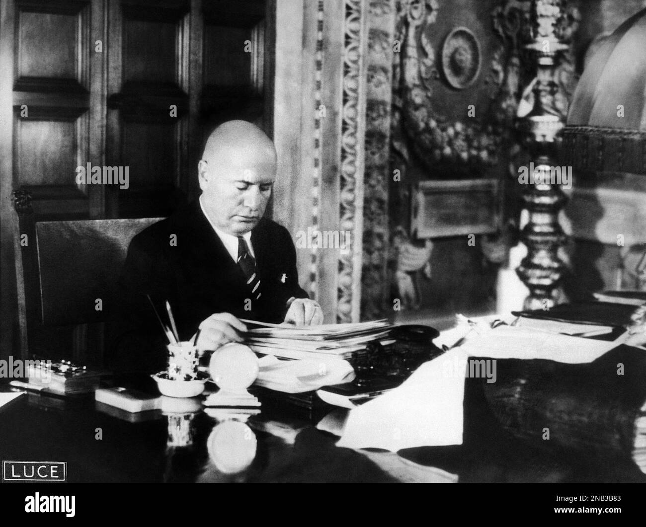 Italian leader Benito Mussolini at work in his office at the Palazzo ...