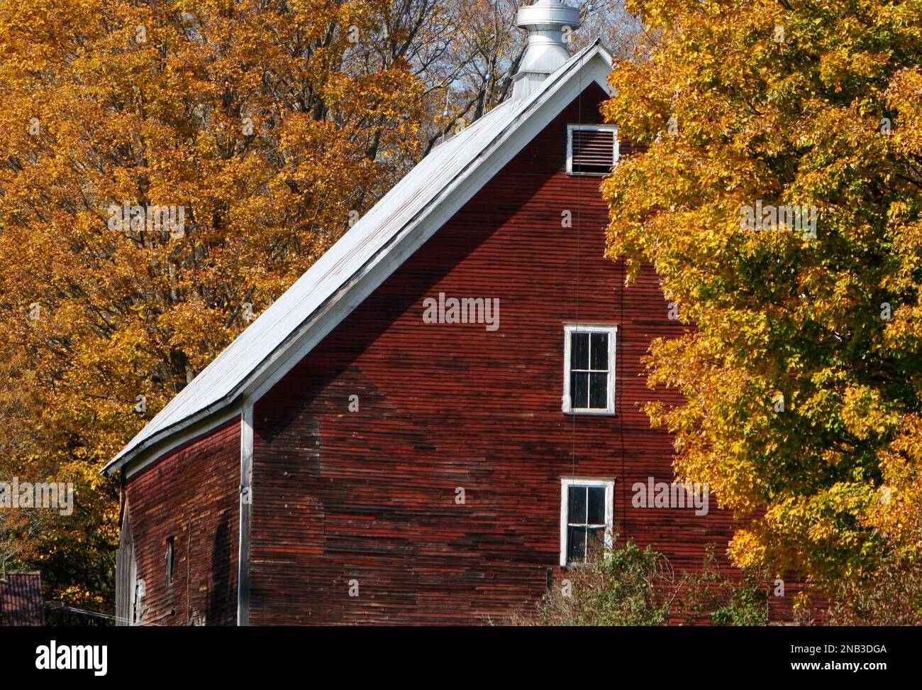 Fall colors frame a red barn on Monday, Oct. 10, 2011 in East ...