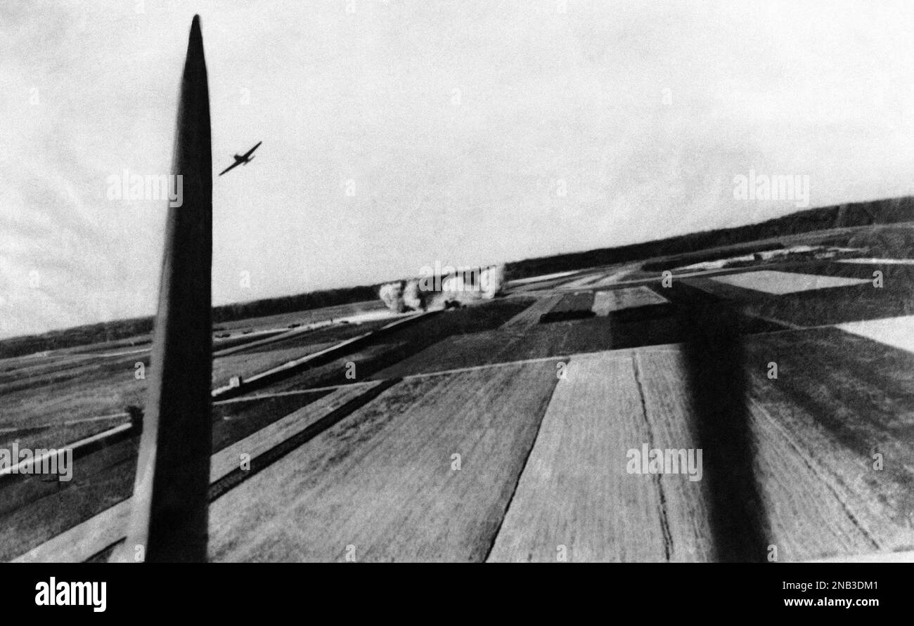 A British plane makes a low level attack on enemy columns of horse ...