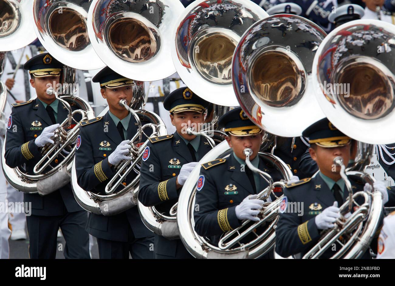 Band members of Taiwan's honor guard play their tubas during the ...