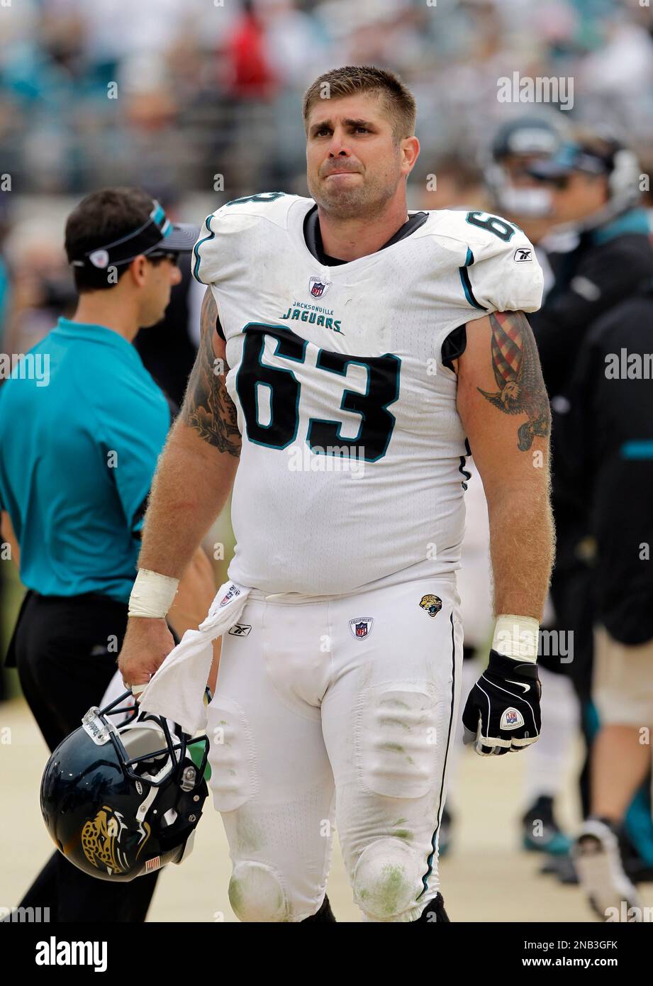 Jacksonville Jaguars center Brad Meester walks in the bench area during ...