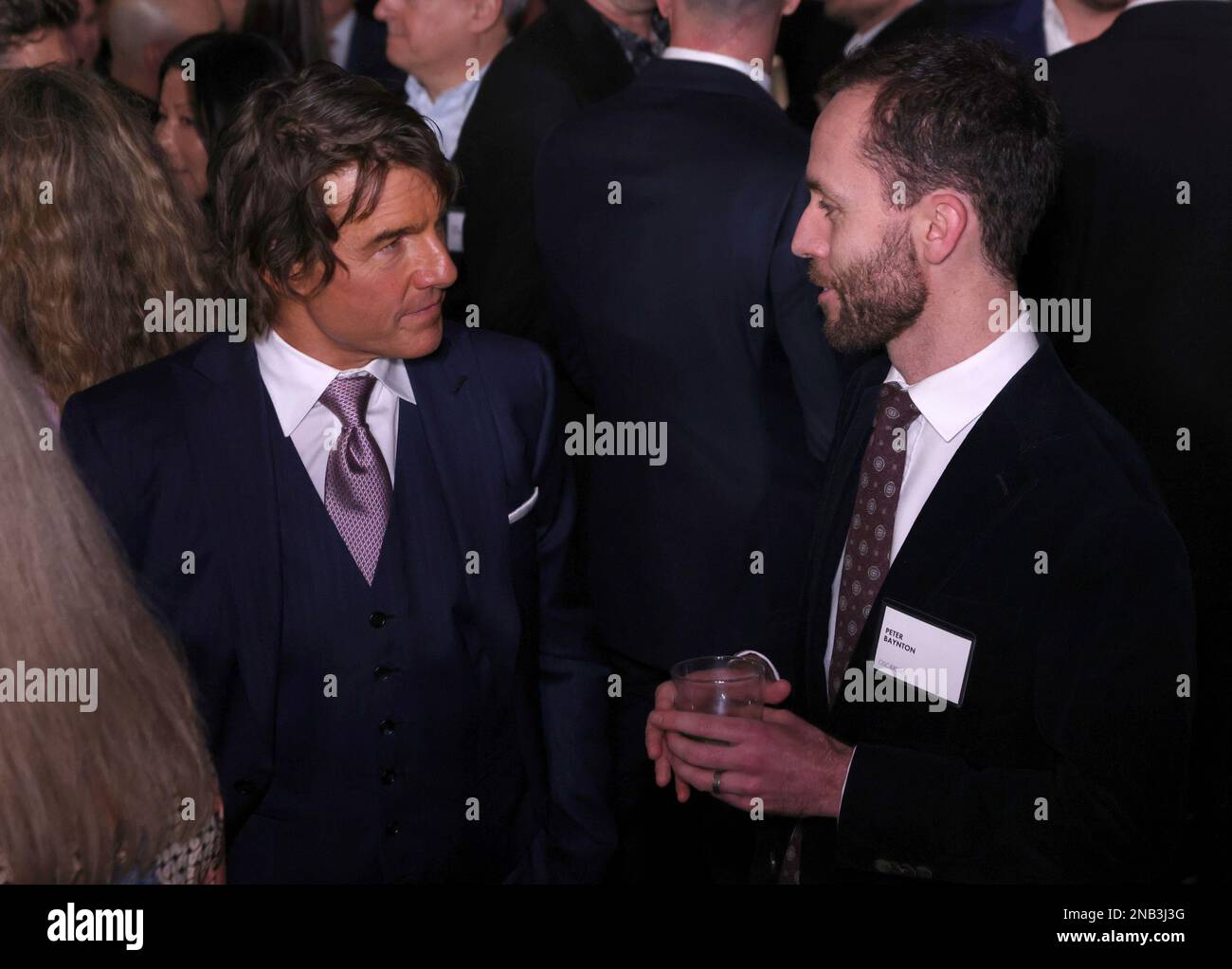 Tom Cruise, left, and Peter Baynton attend the 95th Academy Awards ...