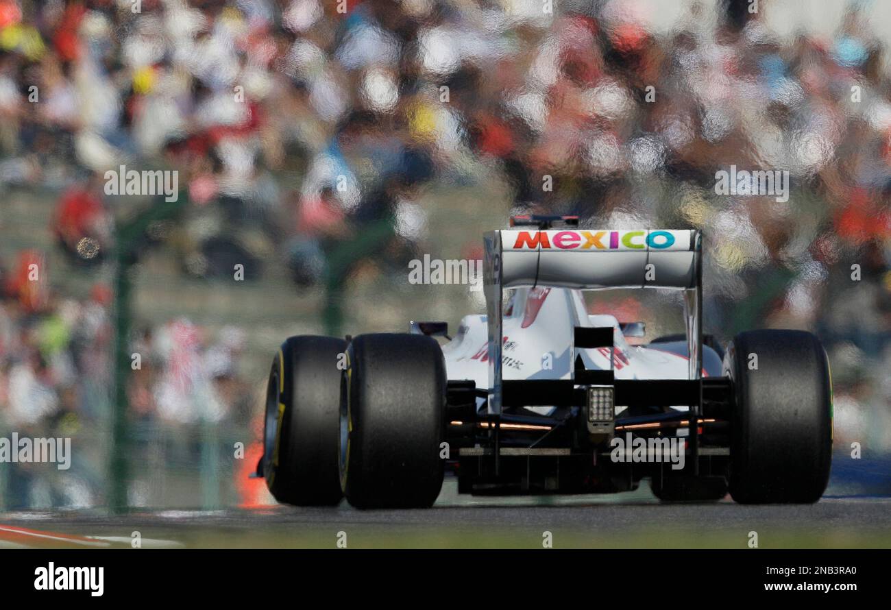 Sauber driver Kamui Kobayashi of Japan steers his car during qualifying ...