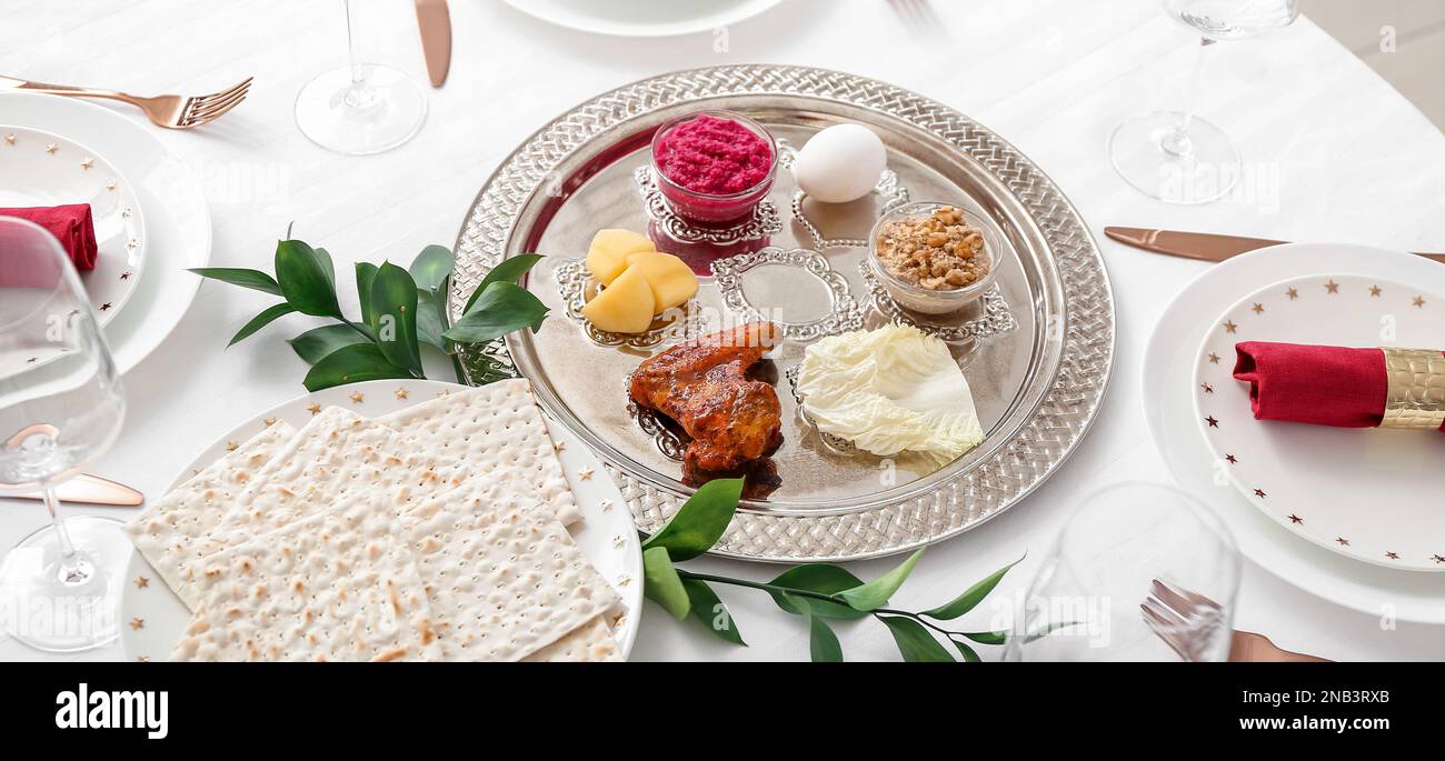 Table served for Passover Seder in dining room Stock Photo - Alamy