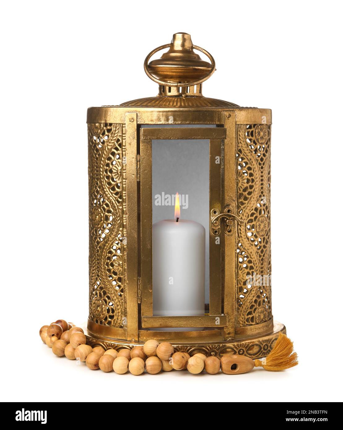 Muslim lantern with burning candle and prayer beads for Ramadan on ...