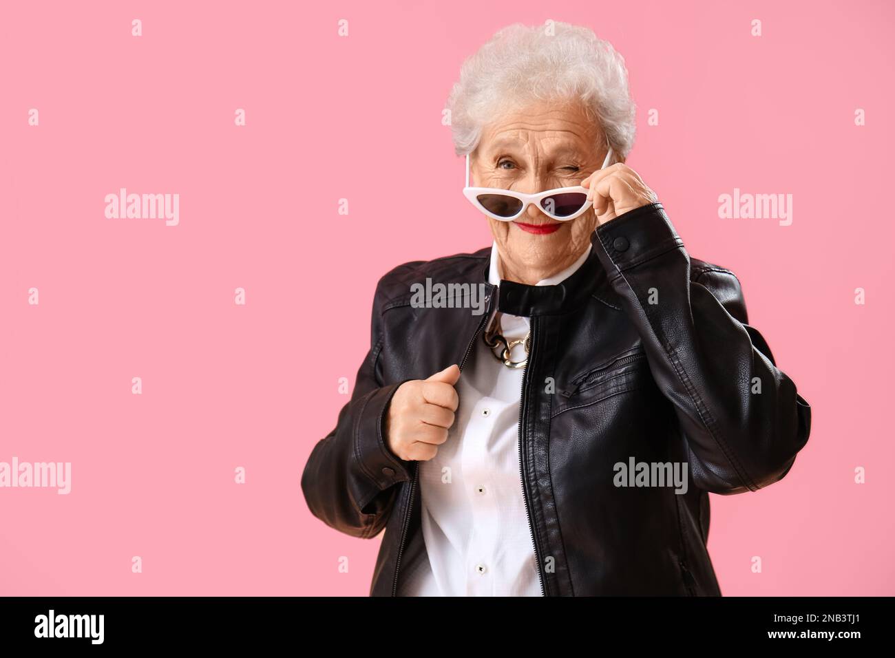 Winking old female senior hi-res stock photography and images - Alamy