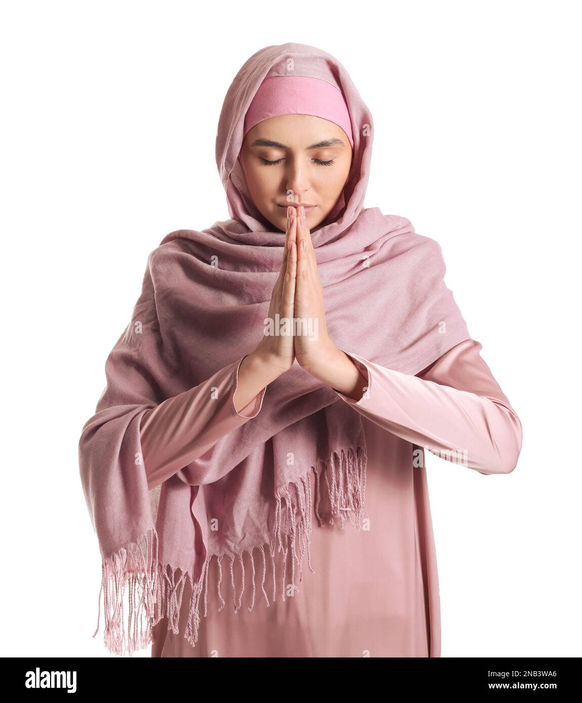 Praying Muslim woman isolated on white Stock Photo - Alamy