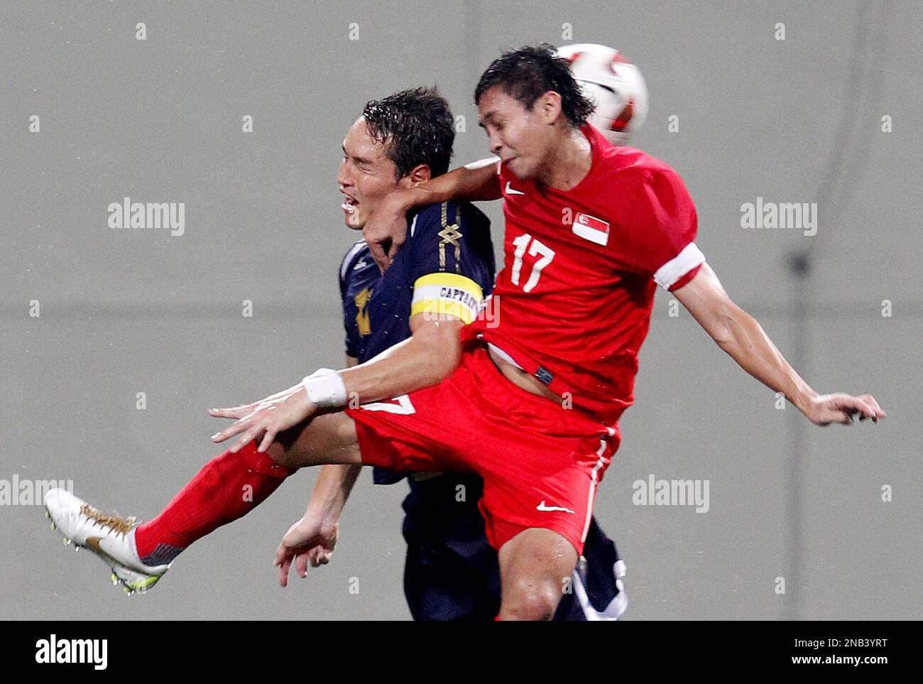 Alexander Borromeo of Philippines, left, and Shahril Ishak of Singapore ...