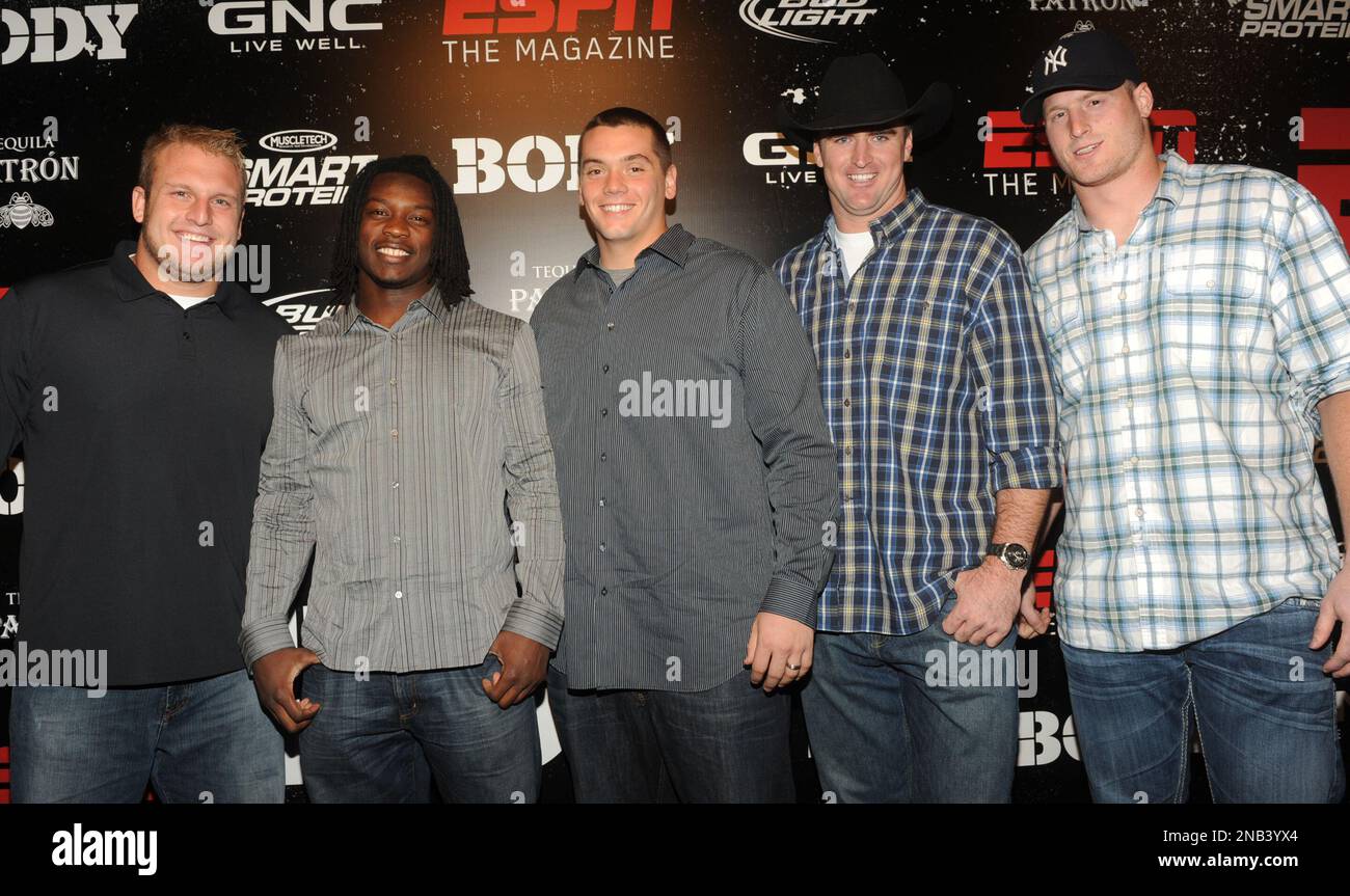 New York Giants football players, from left, Mitch Petrus, Greg Jones ...