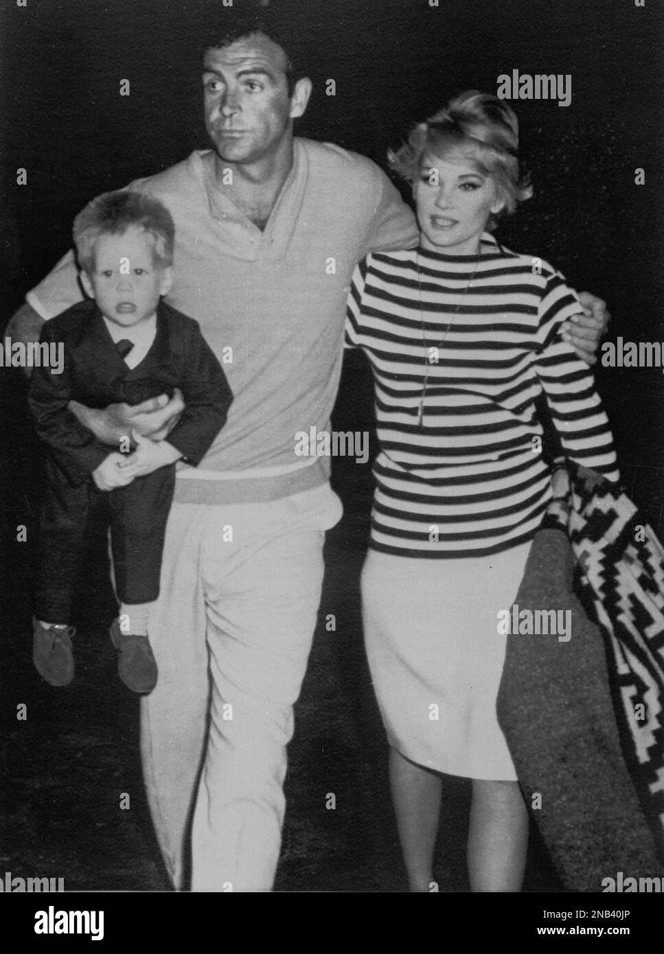 FILE - In this April 14, 1965 file photo, actor Sean Connery, holding ...