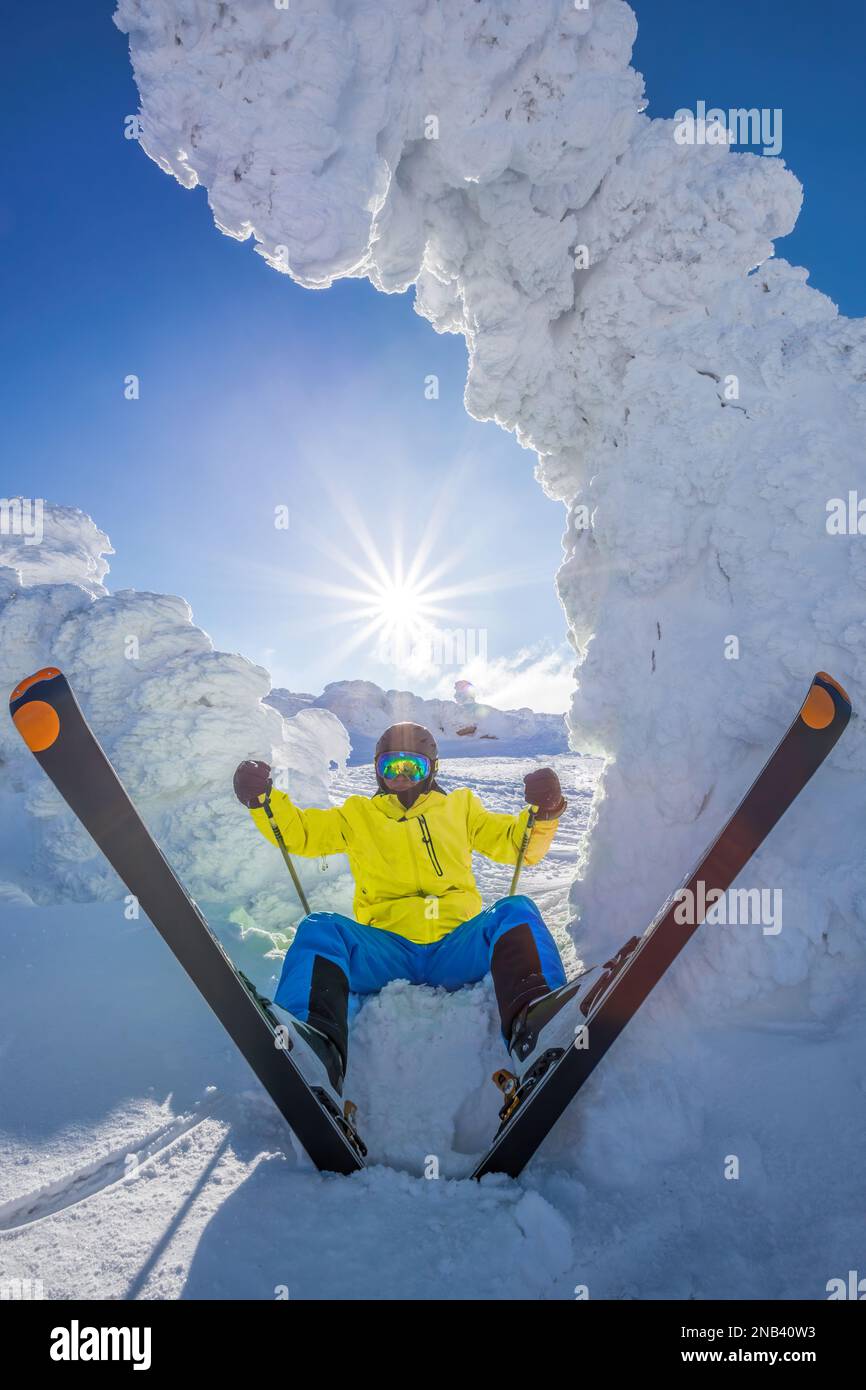 Skier is having fun during beautiful winter scenery in high mountains ...