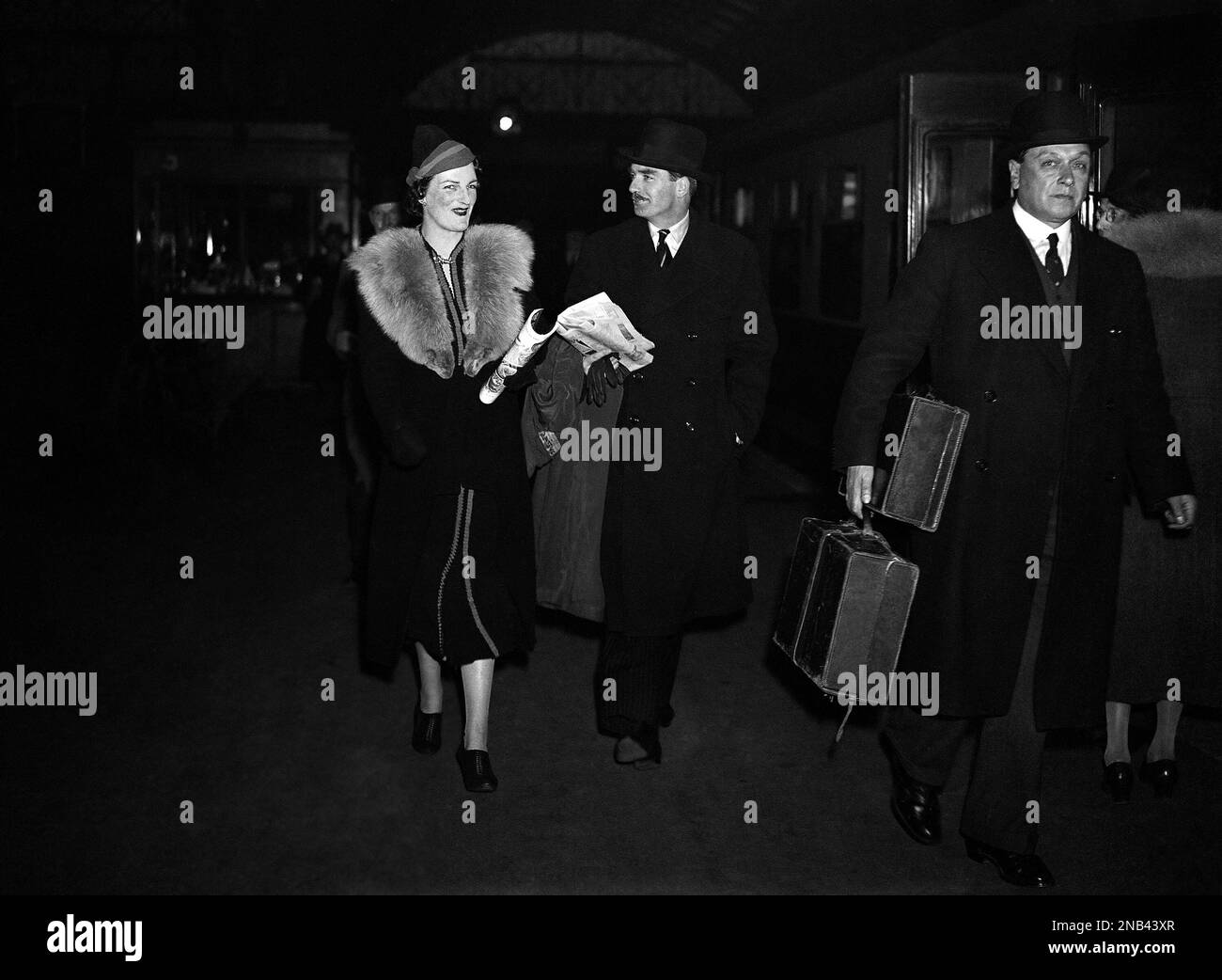 Anthony Eden, resigned Foreign Minister at Paddington Station in London ...