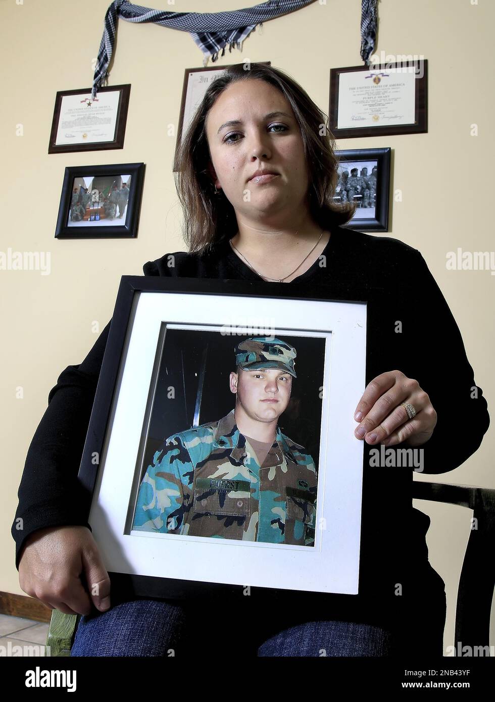 In this Sept. 30, 2011, photo, Tara Fuerst holds a photo of her late ...