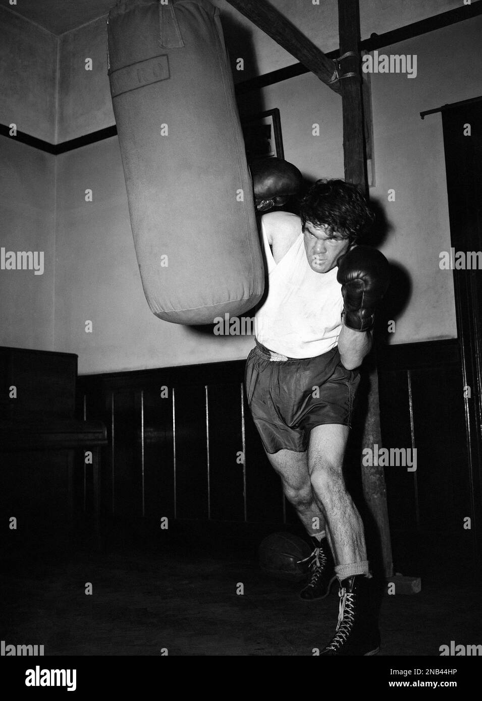 Britain's world cruiser-weight champion Freddie Mills during punching ...