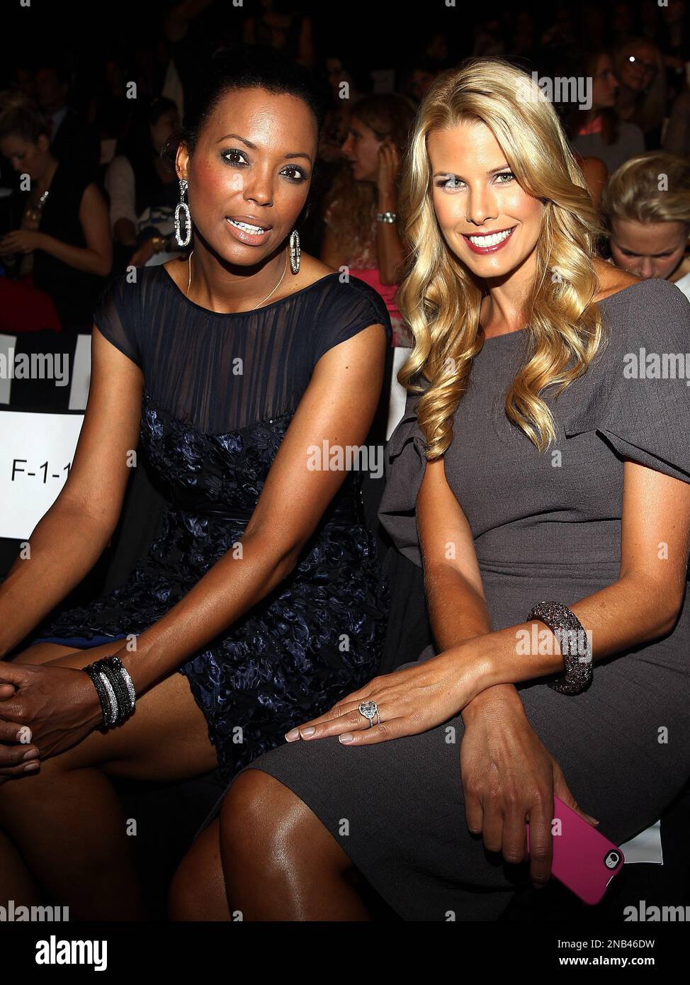 Actress Aisha Tyler, left, and Beth Ostrosky Stern attends the Badgley ...