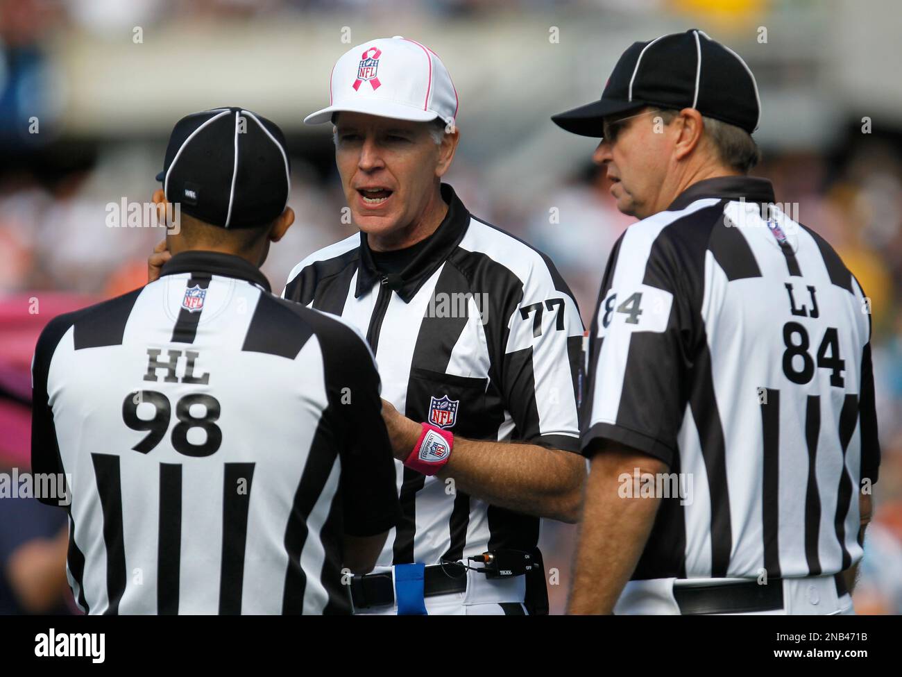NFL referees from left, side judge Greg Bradley (98), referee Terry ...