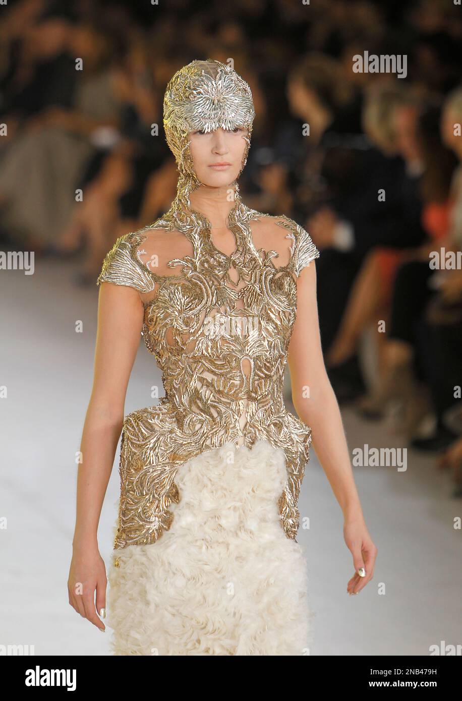 A model displays a creation by British fashion designer Sarah Burton ...