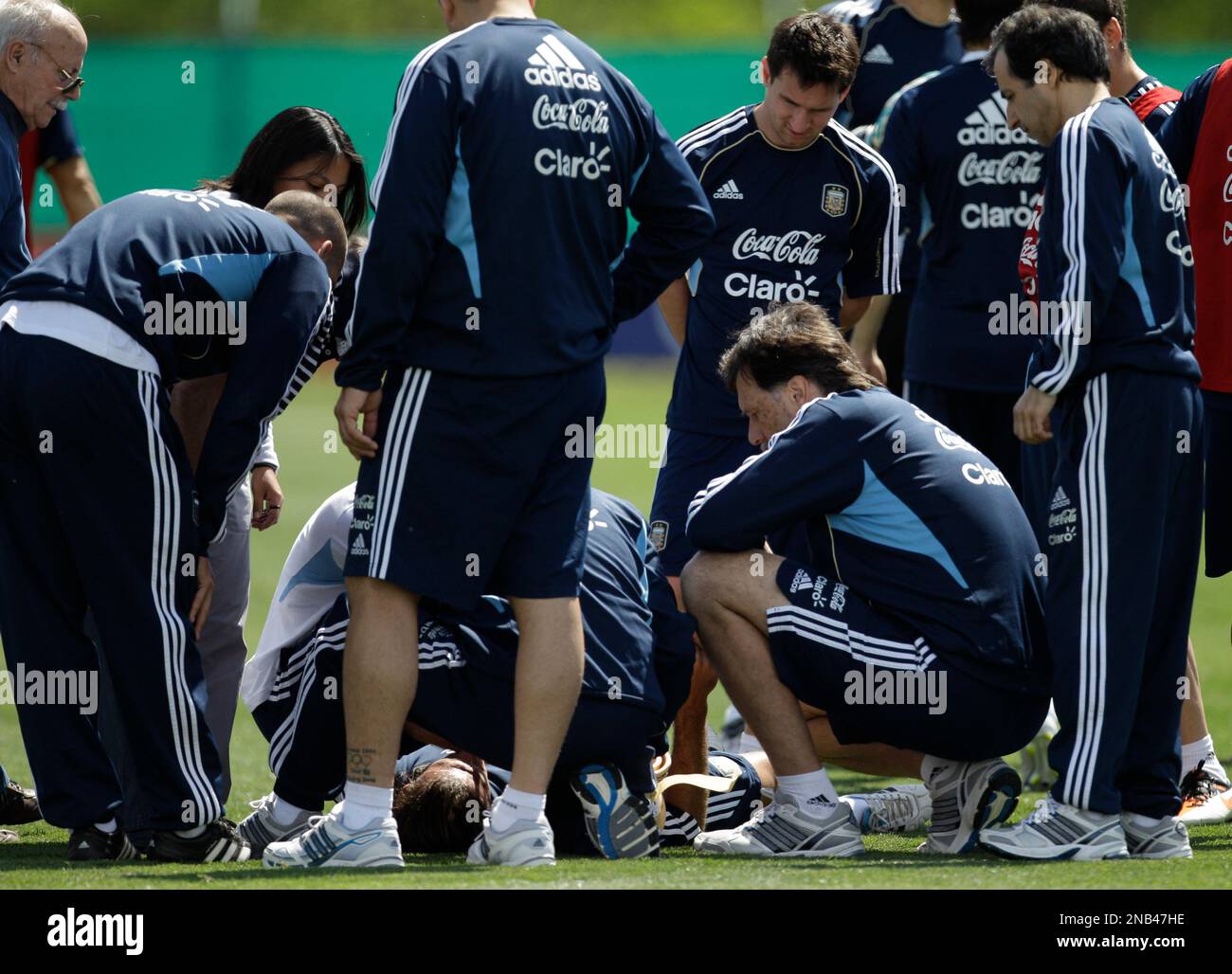 Argentina's Lionel Messi, third right, looks on as Martin Demichelis ...