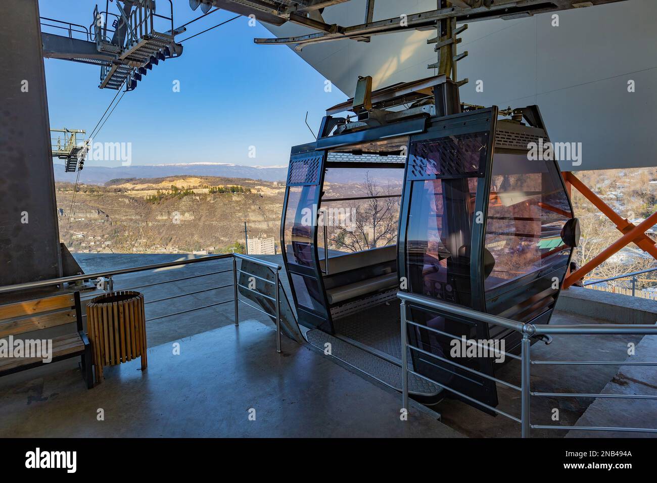 Modern cable car on the upper station of the city Stock Photo - Alamy