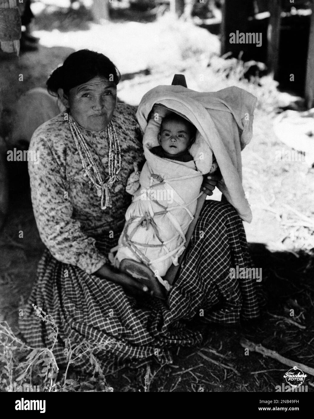 Navajo Indian mother and baby, in New Mexico, in February 1938. The ...