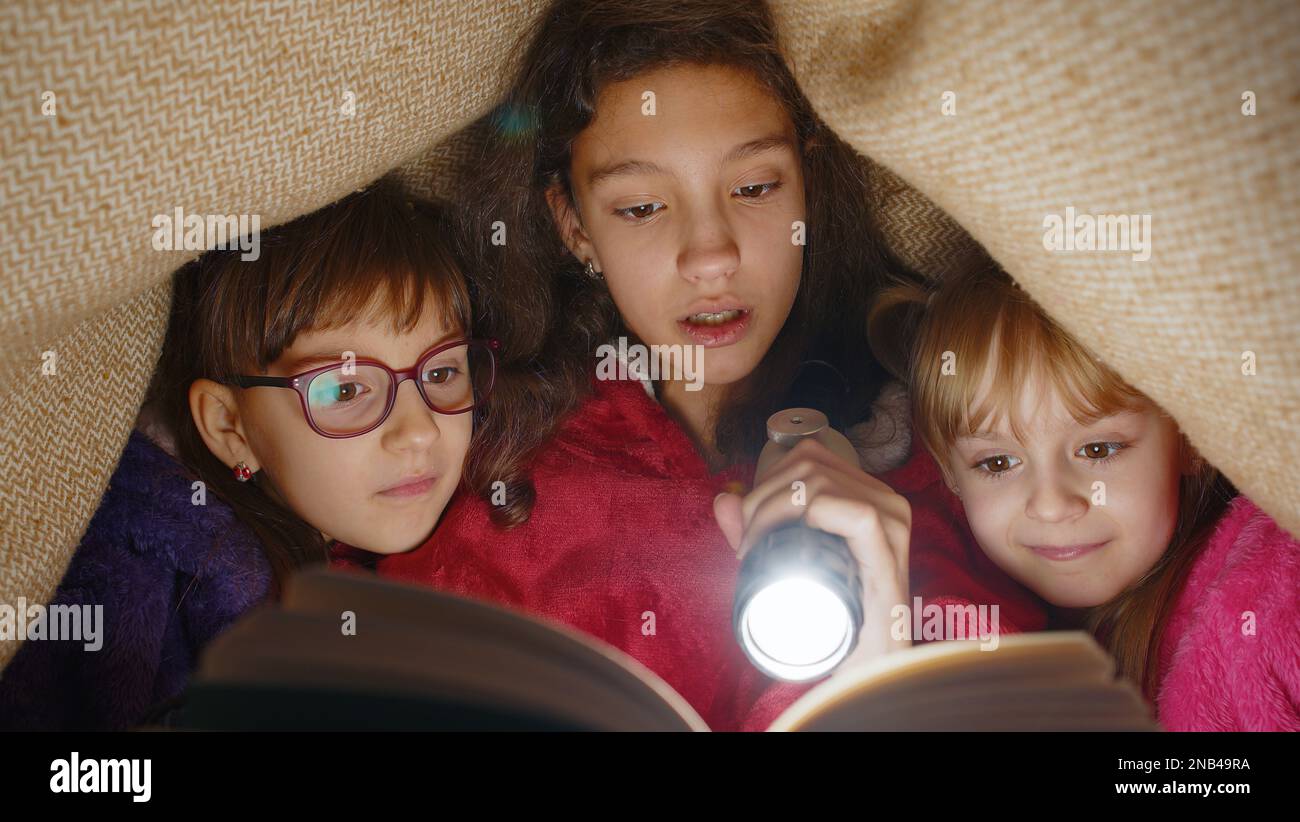 Child preteen flashlight bed hi-res stock photography and images - Alamy
