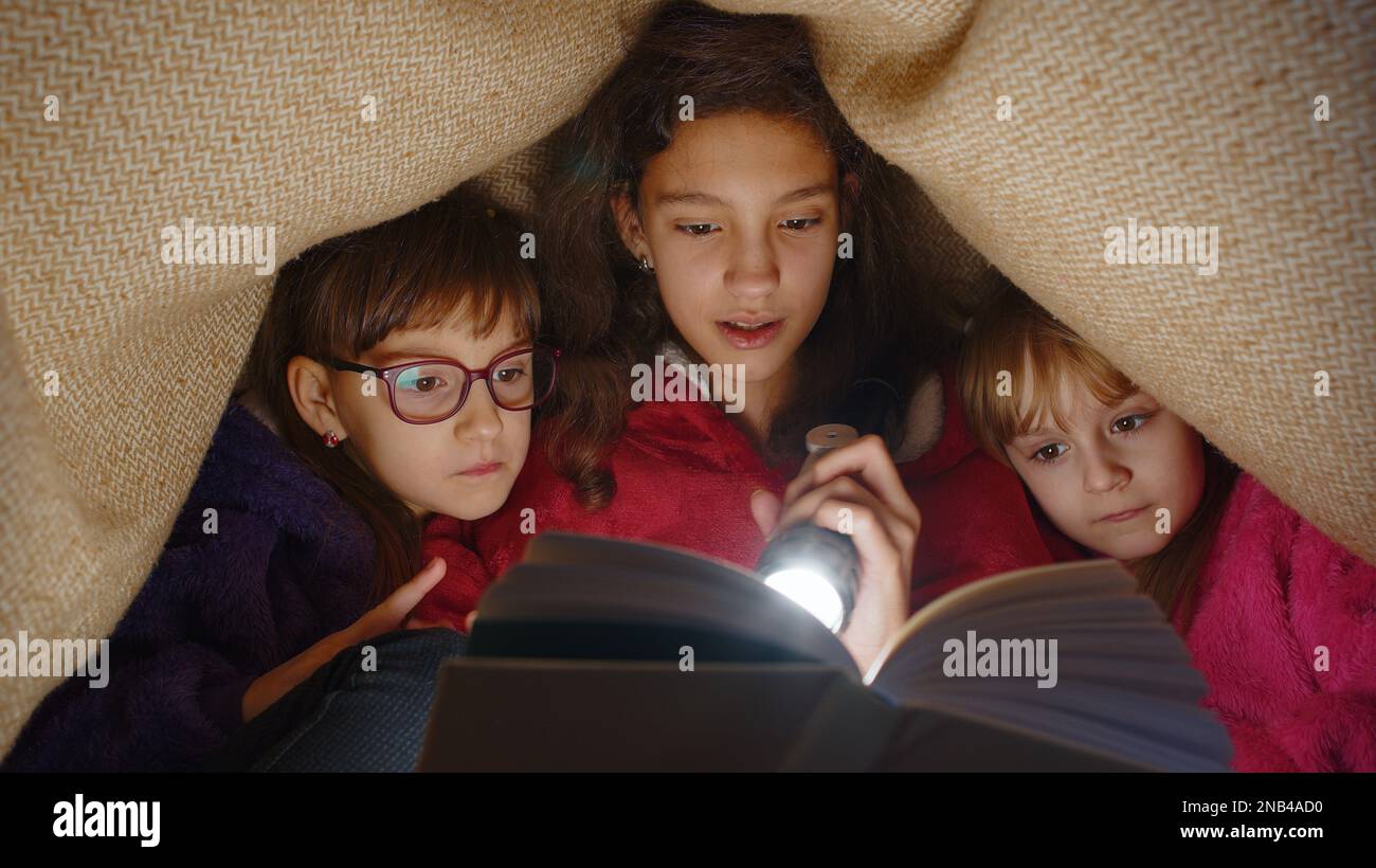 Child preteen flashlight bed hi-res stock photography and images - Alamy