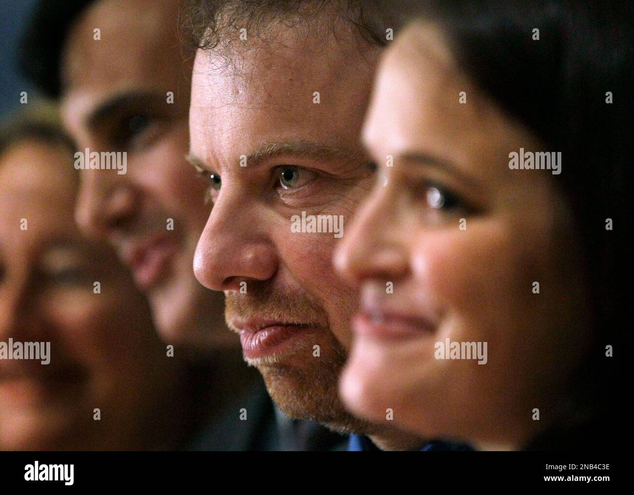 Dr. Adam Riess, center, stands between Johns Hopkins University ...