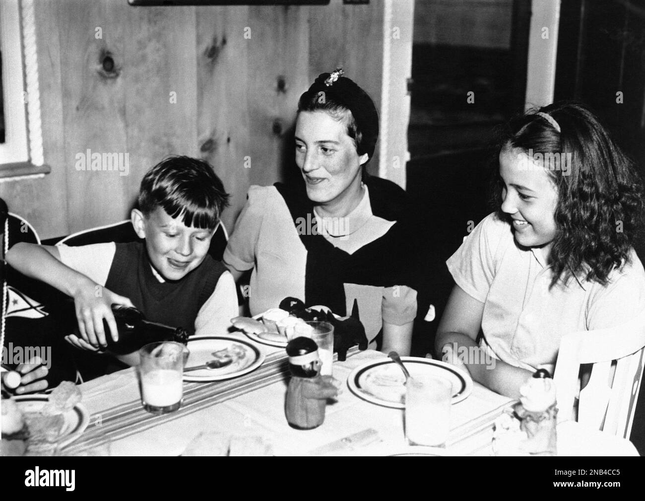 Rudy Dollfuss, left, son of the assassinated Austrian chancellor, pours ...