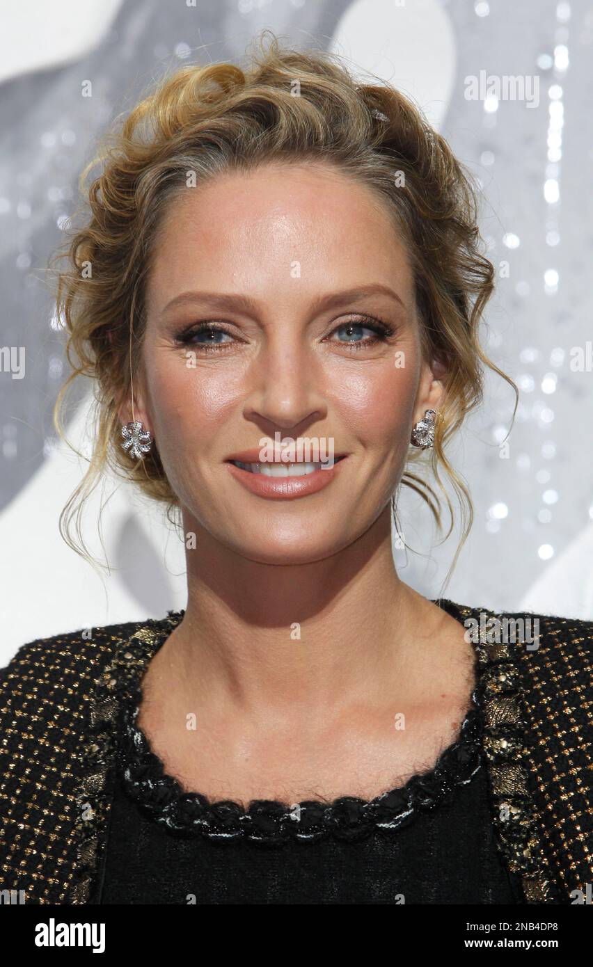U.S actress Uma Thurman arrives at Chanel's spring-summer 2012 ready to ...