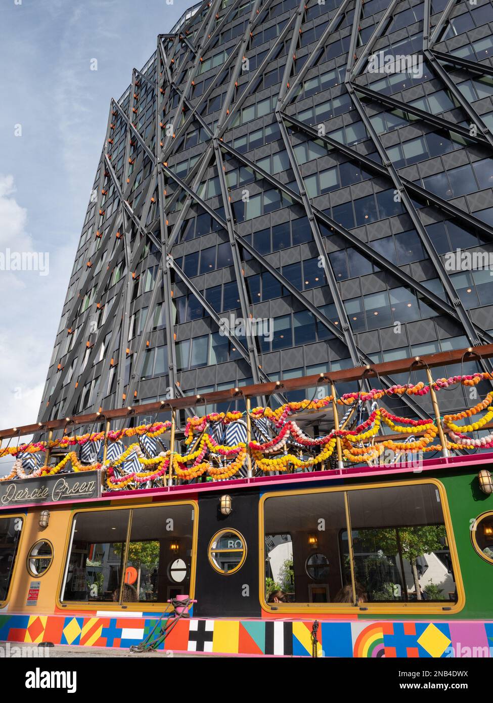 A beautiful view of a high glass building with modern exterior design ...