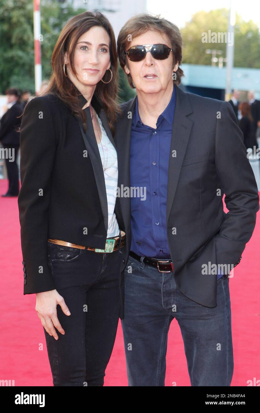 British musician Paul McCartney and Nancy Shevell arrive for the UK ...