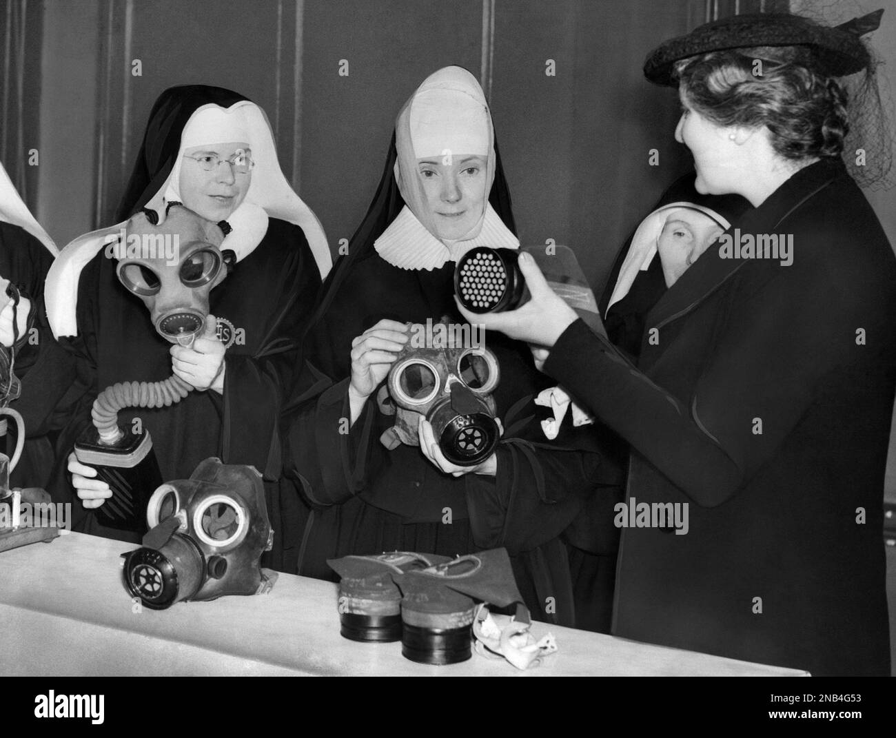These nuns listen as the Dowager Marchioness of Reading explains how a ...