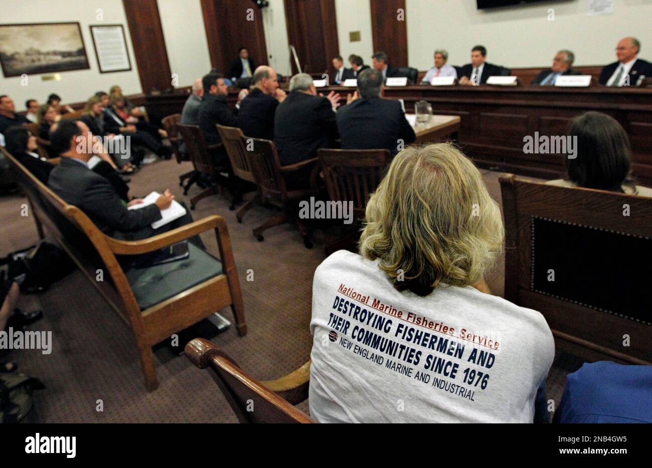 Fisherman Edward Barrett of Plymouth, Mass. wears a t-shirt with a ...