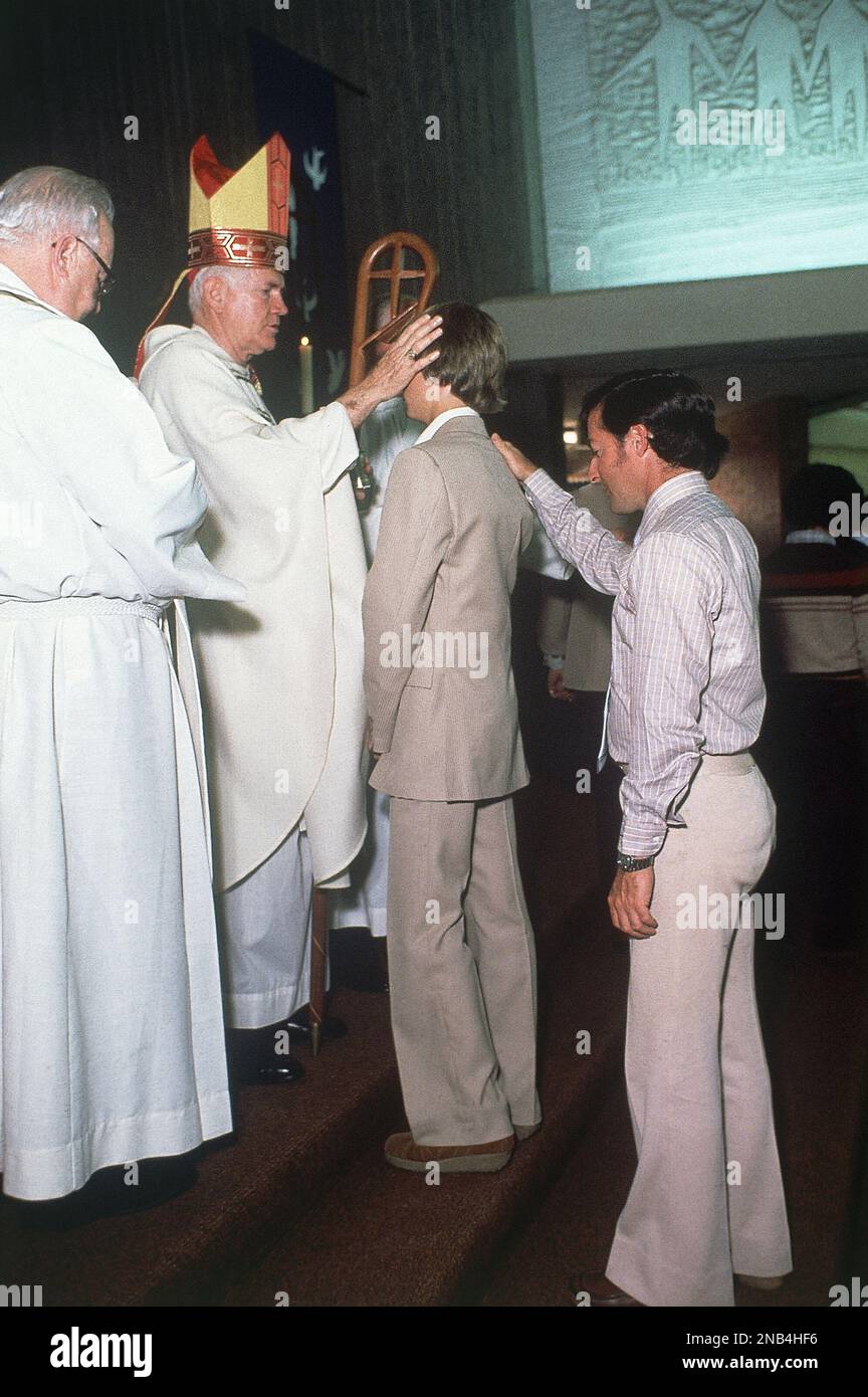 At his confirmation, Jason, son of the first woman soccer referee in ...