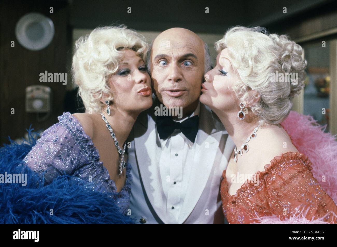 Gavin MacLeod with actress Debbie Reynolds (red dress) and Marilyn ...