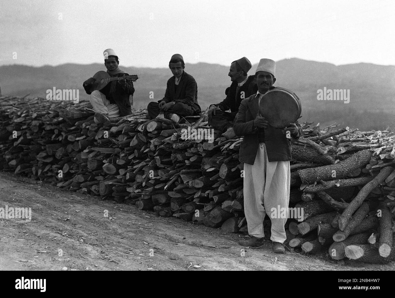 Native musicians in Scutari, with their Albanian instruments, sitting ...