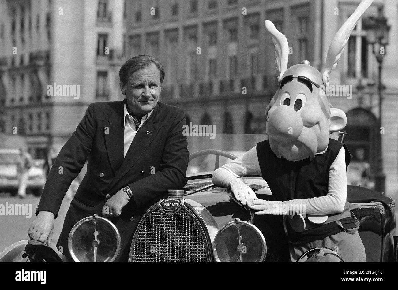 Comic book artist Albert Uderzo poses with his character named Asterix ...