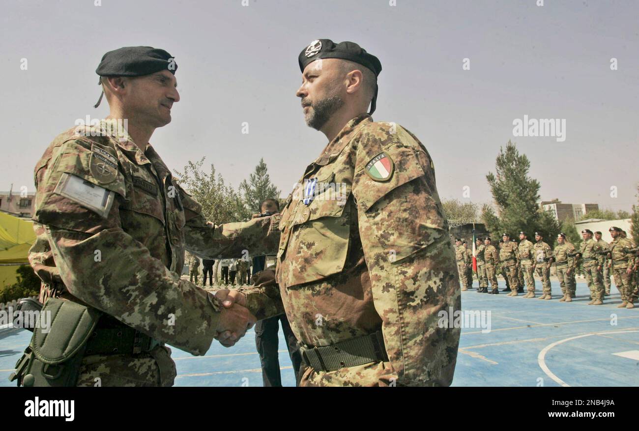 Colonel Paolo Pomella, right, previous commander of Italian 16th ...